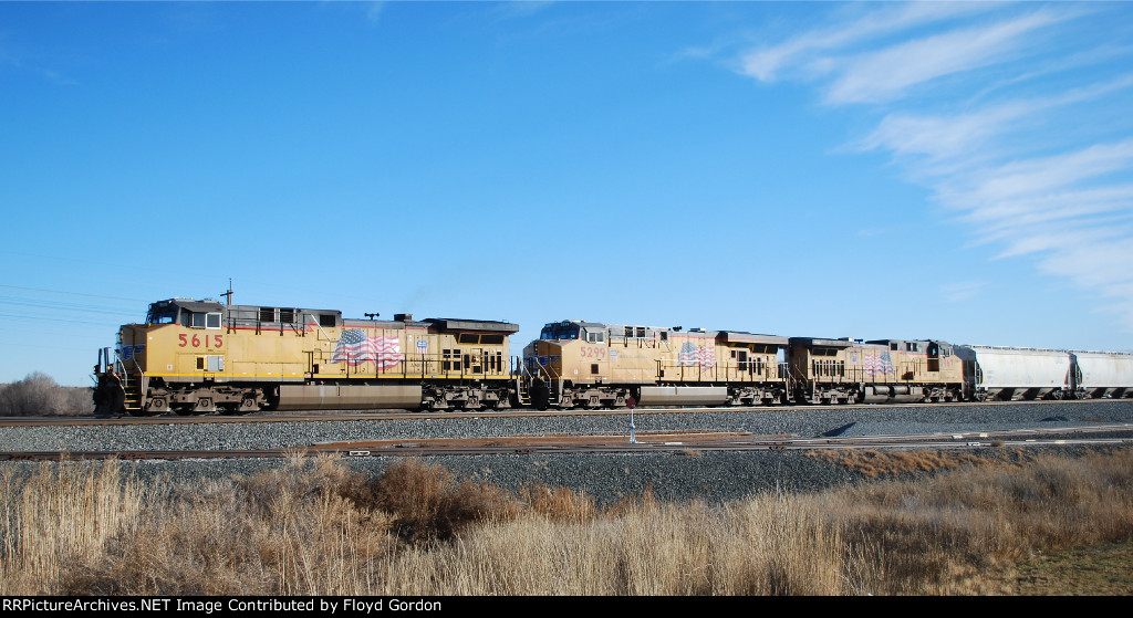 UP 5615 leads west bound UP freight on to main from siding